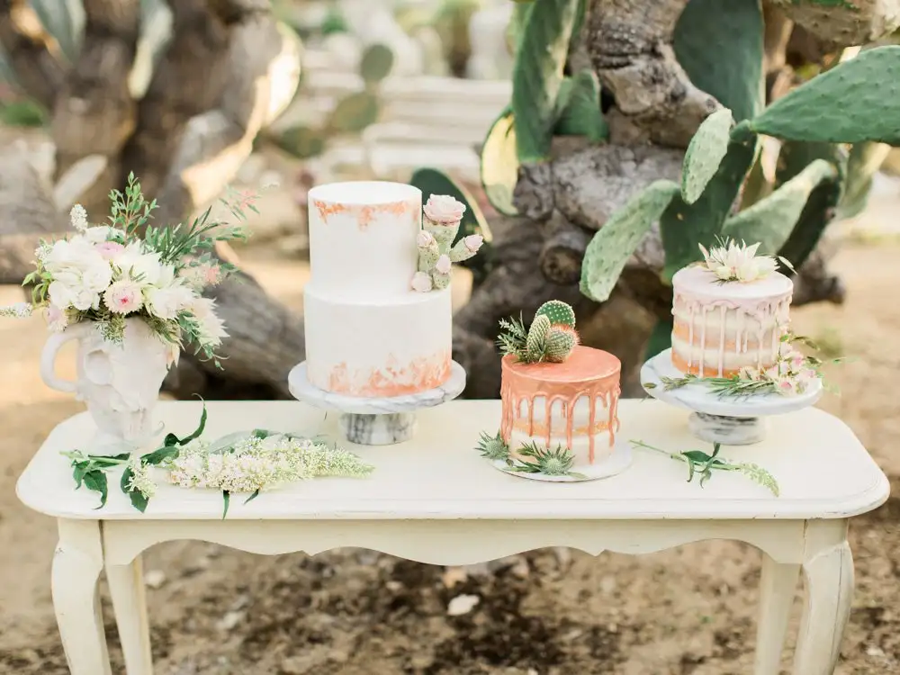 Table with Small, Chic Cakes