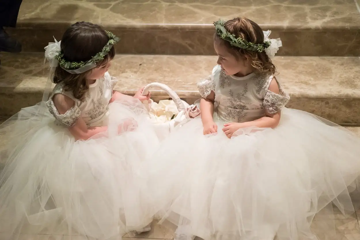 Two Flower Girls on Steps