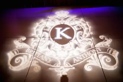 Reception Décor Photos - Illuminated Dance Floor Logo - Inside Weddings
